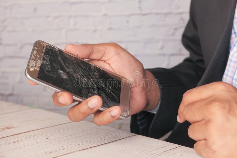 Close Up of Man Hand Holding Broken Smart Phone. Stock Image - Image of ...