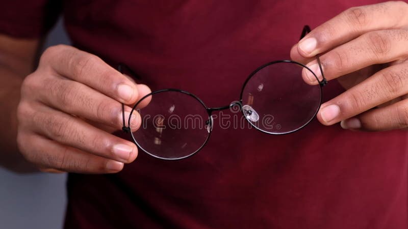 Close Up of Man Hand Holding Eyeglass in Dark. Stock Video - Video of ...