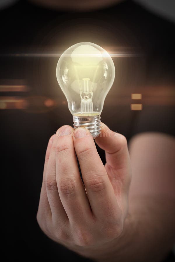 Close Up of Man Hand Holding Light Bulb Stock Image - Image of hold ...