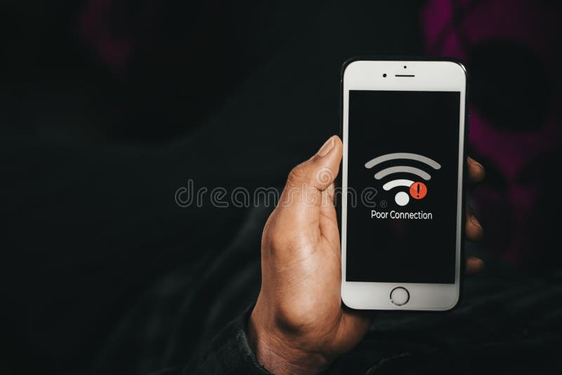 Close Up of Man Hand Holding a Smart Phone with Sign Bad Connection on ...
