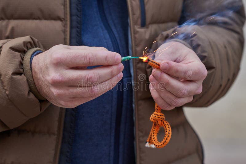 Close Up of Man Hand Lighting Up a Firecrackers with Wick Stock Image ...