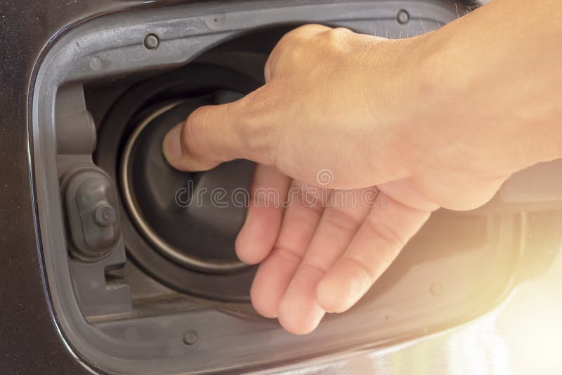 Close Up Man Hand Open the Gas Tank and Holds the Gas Tank Cap Stock ...