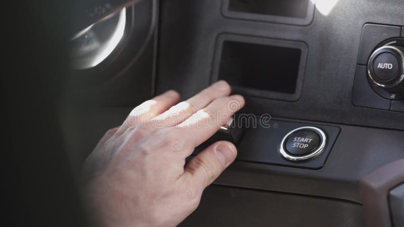 Close Up of Man Hand Pushing the Car Starting Button. Scene. View ...