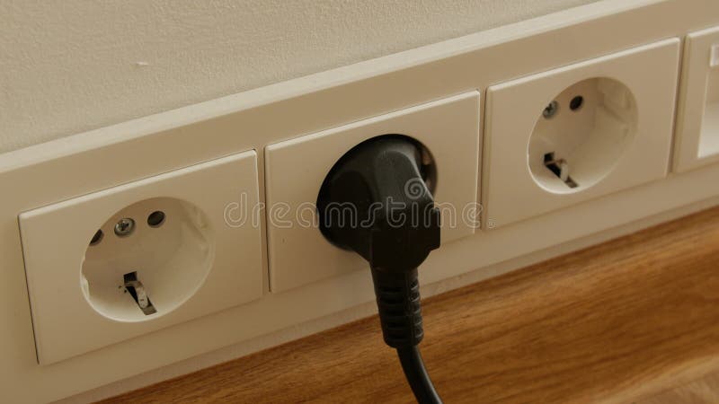 Close Up of Man Hand Putting Plug in Electricity Socket. Stock Footage ...