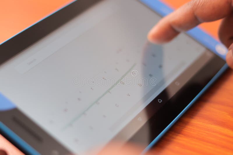 Close Up of a Man Hand Typing by Using Swype Keyboard on Digital Tablet ...