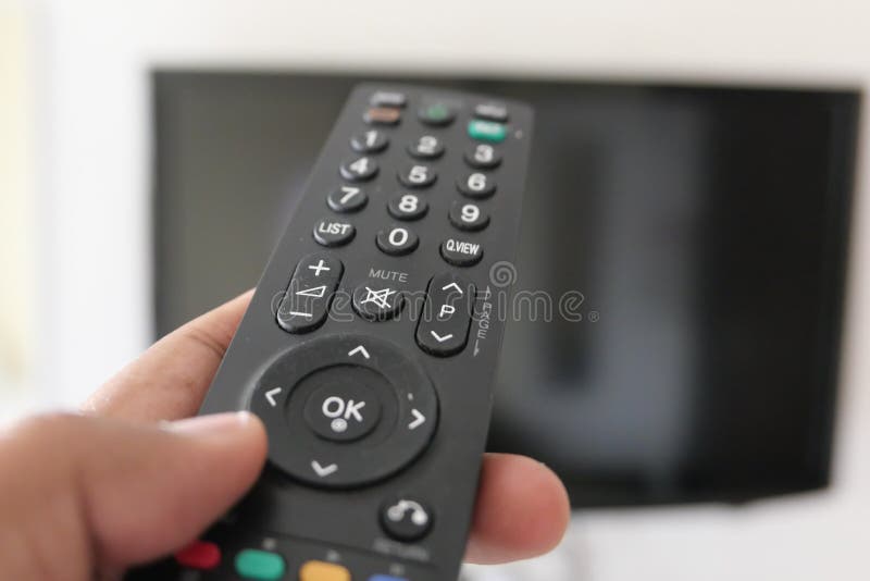 Close Up of Man Hand Use Tv Remote Stock Photo - Image of signs ...