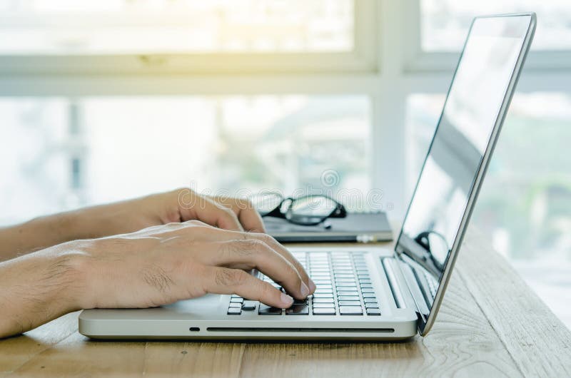 Close-up Man Hand Using Computer Laptop in Office. Stock Image - Image ...