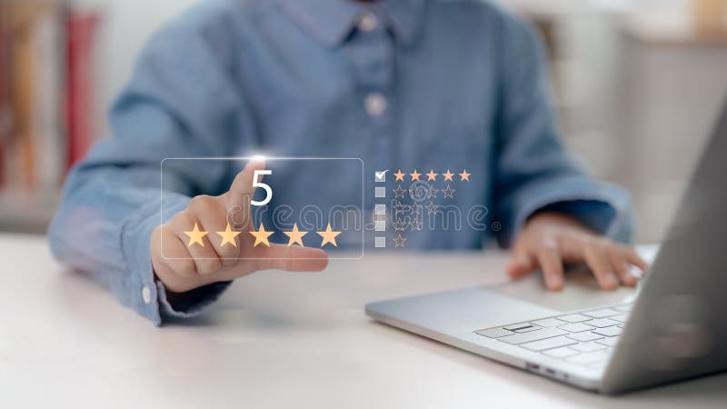 Close Up Man Hand Using Computer Notebook with Popup Five Star Icon for ...