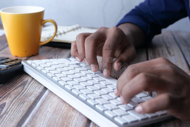 Close Up of Man Hand Using Keyboard on Table Stock Image - Image of ...