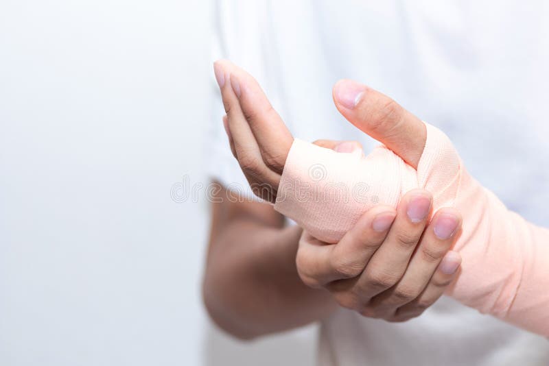 Close-up of a Man Hand Wrapping Elastic Bandage. Wounded Hand Cover ...