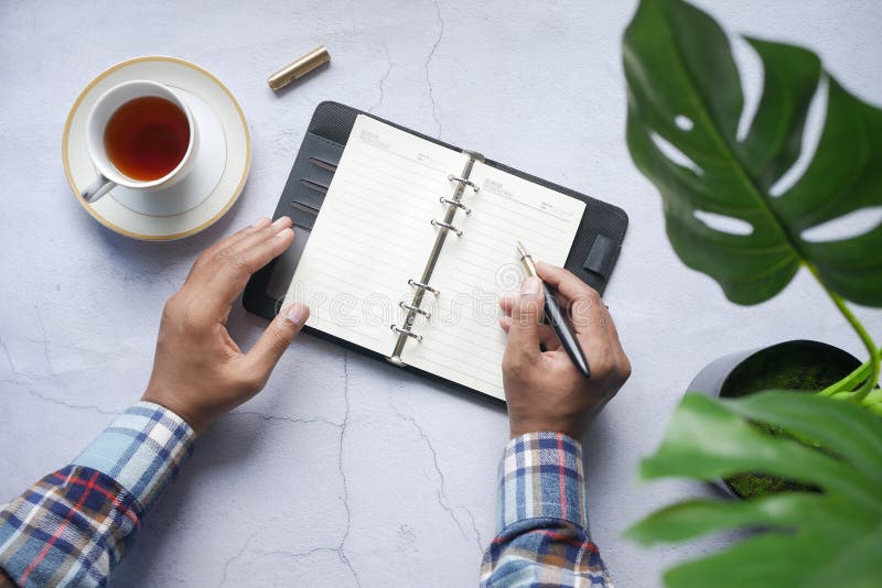Top View of Man Hand Writing with Fountain Pen on Notepad. Stock Image ...
