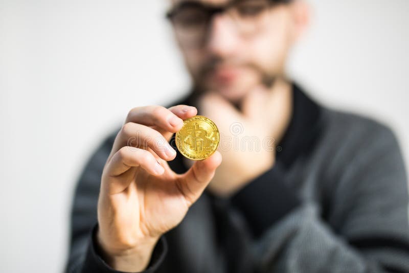 Close Up Of Man Hands With Bitcoin With Thinking Man Face On Background ...