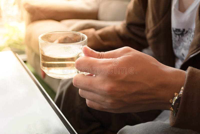 Close Up of Man Hands Holding Hot Tea Cup Stock Photo - Image of ...