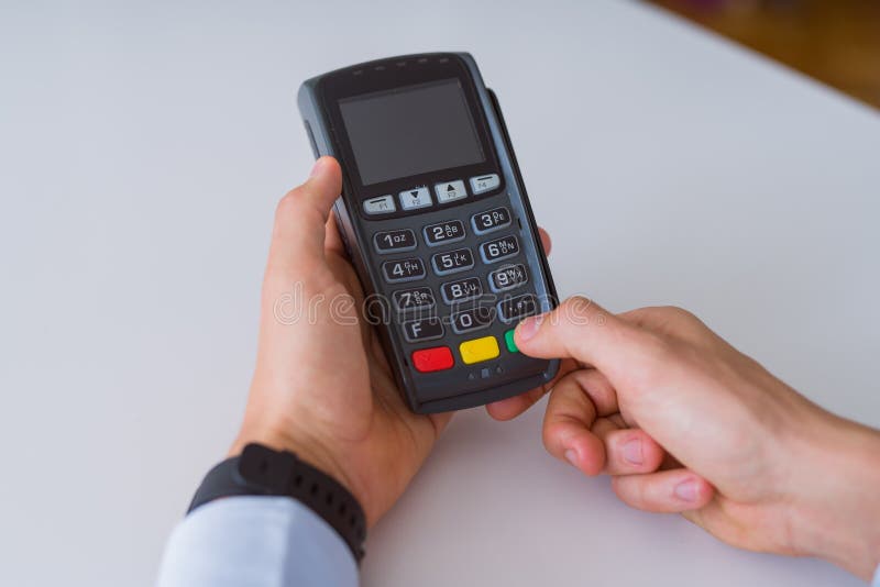 Close Up of Man Hands Holding Pos Terminal Stock Photo - Image of ...