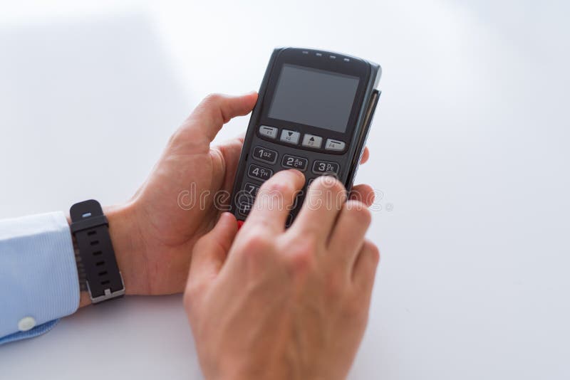 Close Up of Man Hands Holding Pos Terminal Stock Image - Image of ...