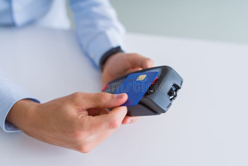 Close Up of Man Hands Holding Pos Terminal Stock Image - Image of close ...