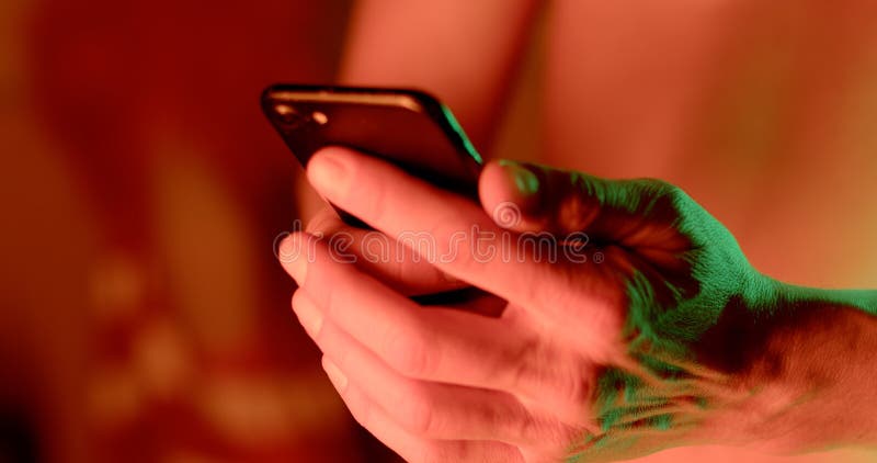Close-up of a Man Hands Using a Phone, he Plays a Game Using Mobile ...