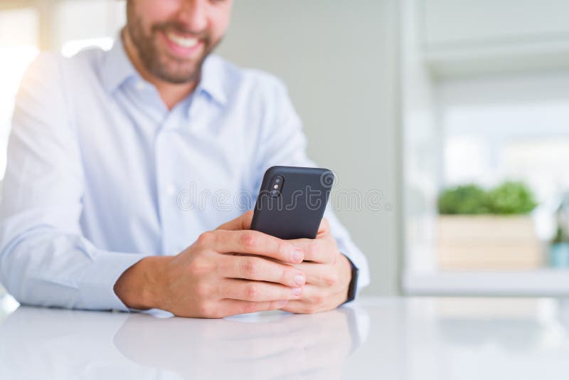 Close Up of Man Hands Using Smartphone and Smiling Stock Photo - Image ...