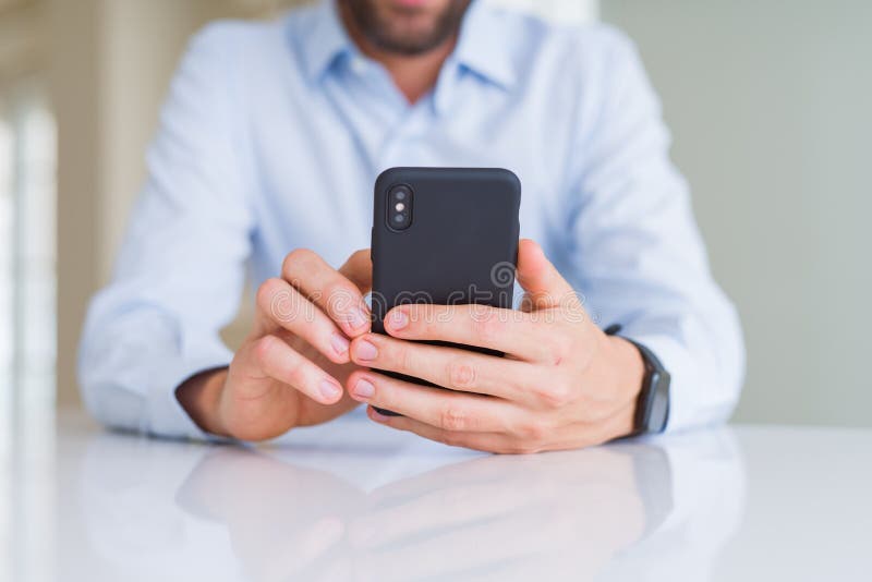 Close Up of Man Hands Using Smartphone and Smiling Stock Image - Image ...