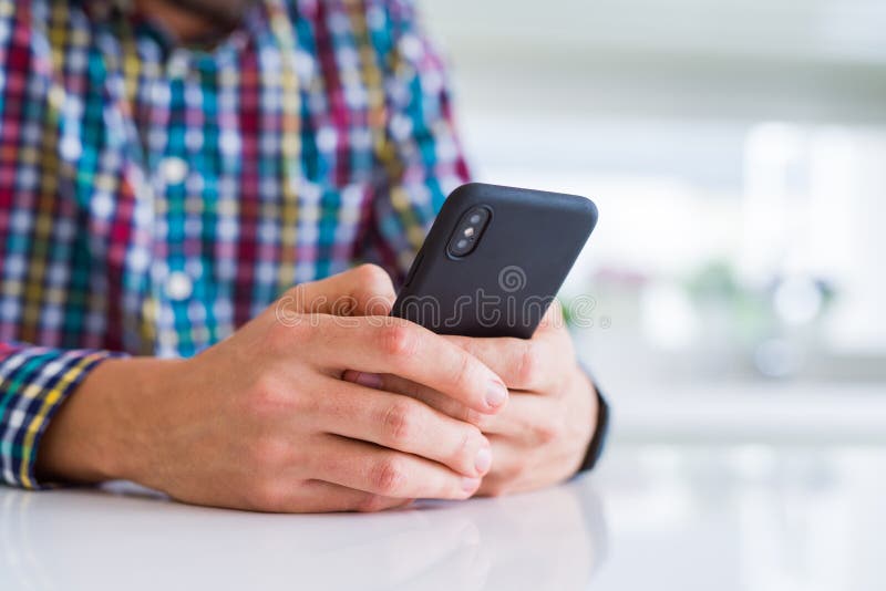 Close Up of Man Hands Using Smartphone and Smiling Stock Photo - Image ...