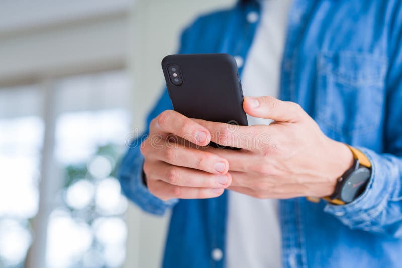 Close Up of Man Hands Using Smartphone and Smiling Stock Image - Image ...