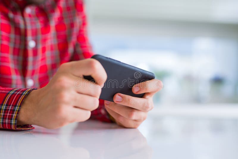 Close Up of Man Hands Using Smartphone and Smiling Stock Photo - Image ...
