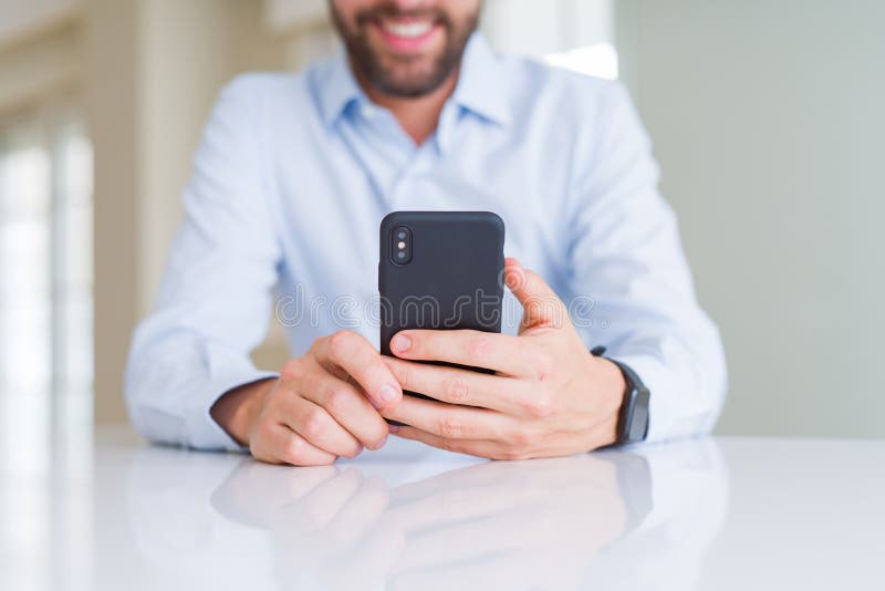 Close Up of Man Hands Using Smartphone and Smiling Stock Image - Image ...