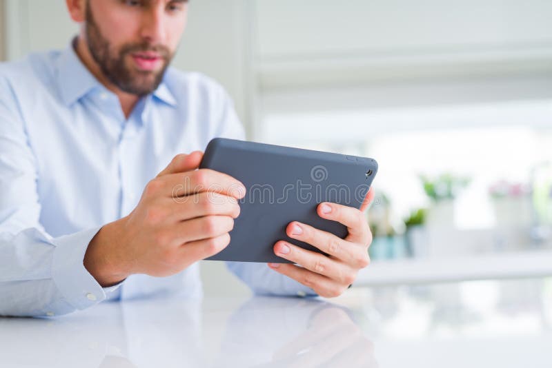 Close Up of Man Hands Using Tablet and Smiling Stock Photo - Image of ...