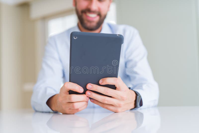 Close Up of Man Hands Using Tablet and Smiling Stock Photo - Image of ...