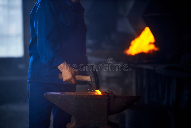 Close Up of Man Hitting with Hammer on Glowing Hot Metal Stock Image ...