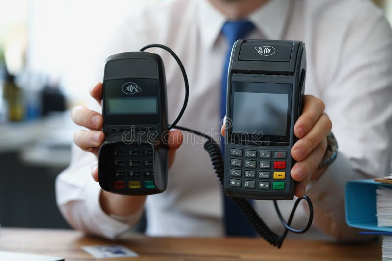 Man Hold Different Models of Credit Card Reader Machines for Cashless ...