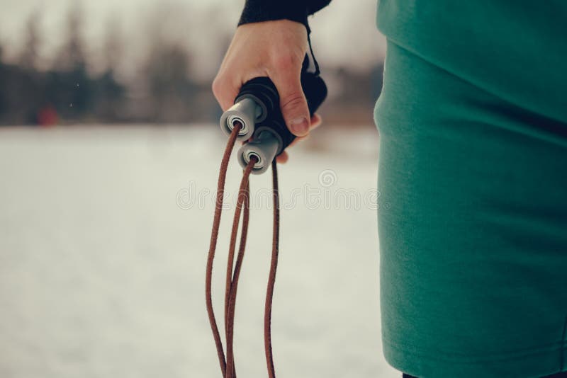 Man Holding Jumping Rope on the Cold Snowy Day Stock Photo - Image of ...