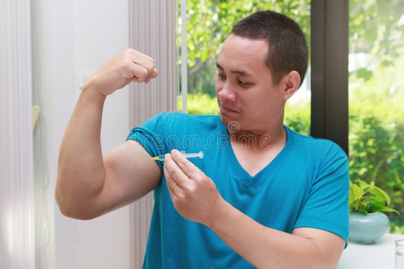 Close Up of a Man Injecting Steroid into the Biceps Stock Image - Image ...