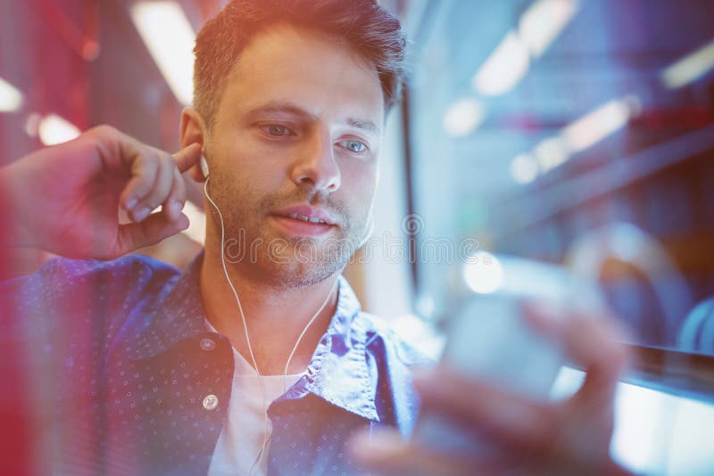 Close Up of Man Listening Music on Mobile Phone Stock Image - Image of ...