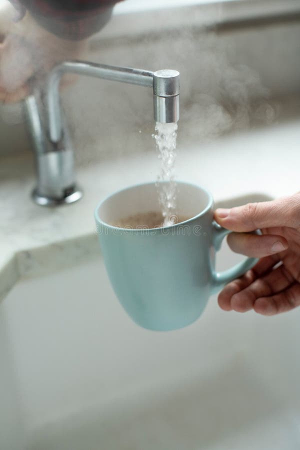 Close Up of Man Making Hot Drink from Boiling Water Tap Stock Photo ...