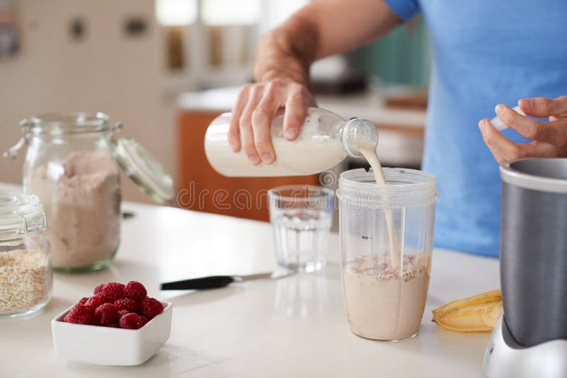 Close Up of Man Making Protein Shake after Exercise at Home Stock Photo ...