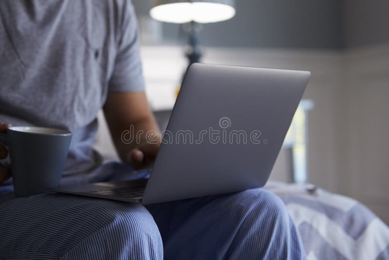 Close Up of Man in Pajamas Using Laptop Computer Stock Image - Image of ...