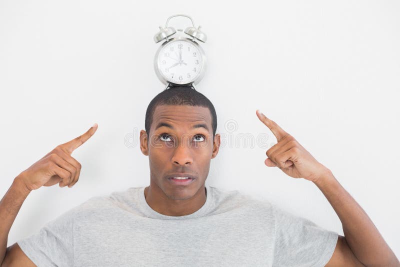 Close Up Man Pointing Alarm Clock Over His Head Stock Photos - Free ... Close Up Man Pointing Alarm Clock Over His Head Stock Photos - Free ...