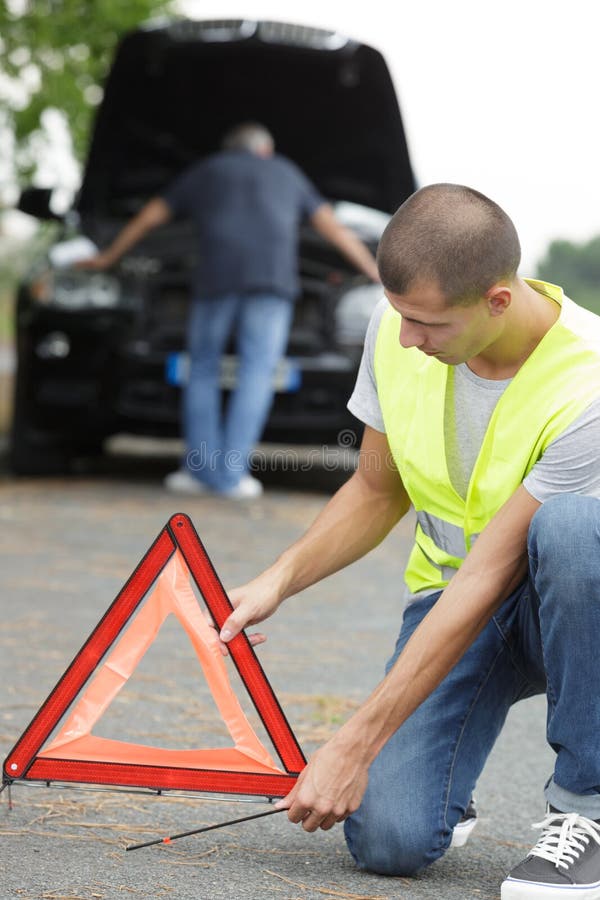 Close Up Man Putting Road Triangle Stock Image - Image of sign ...