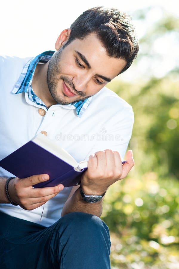 Close up man reading book stock photo. Image of careless - 43905748
