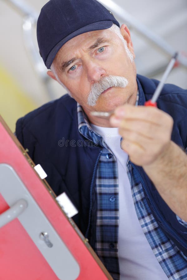 Close- Up for Man Repairs Lock from Gate Stock Photo - Image of senior ...