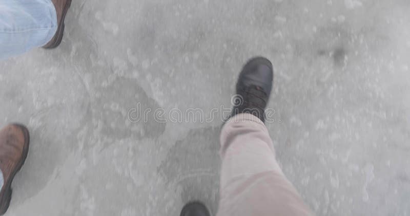 Close-up of a Man S Feet on Melted Ice Stock Footage - Video of ...