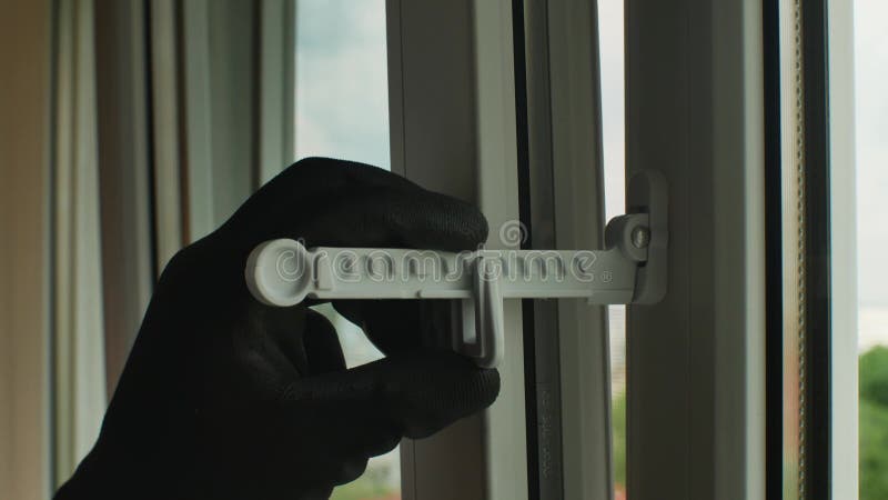Close-up of a Man S Hand in a Construction Glove Adjusting a Window ...