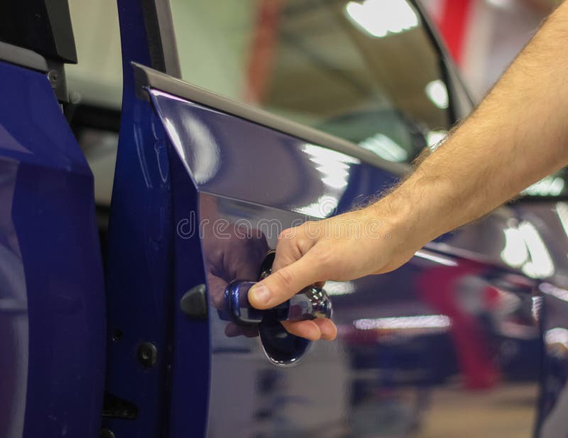 Close-up of a Man S Hand Holding the Handle of a Car. Stock Photo ...