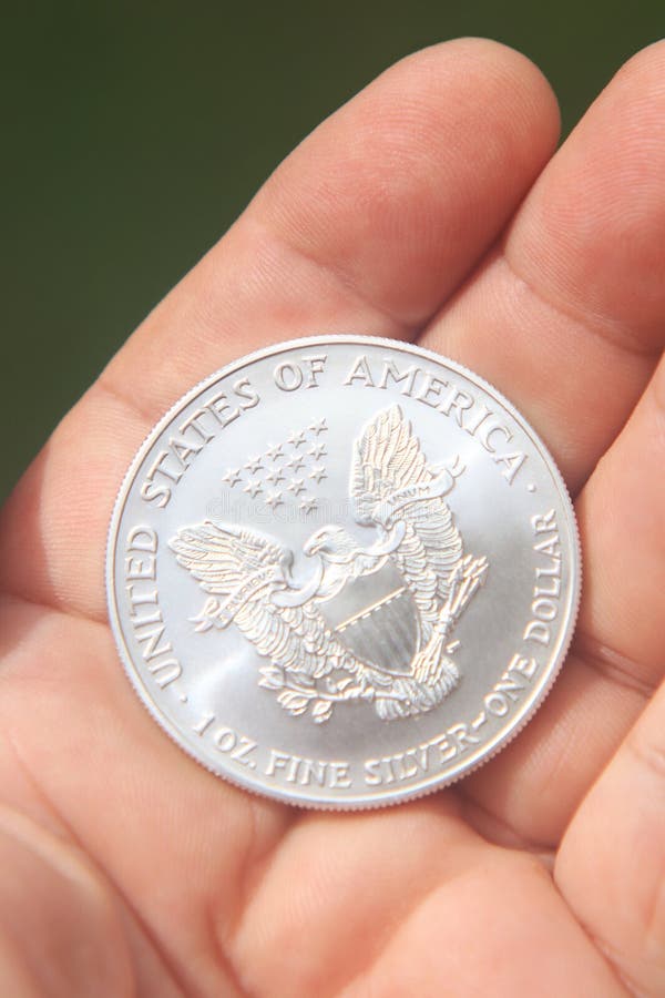A Hand Holding a USA Silver Dollar Editorial Photography - Image of ...