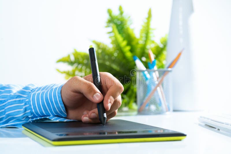 Close-up of a Man S Hand with a Pen Stylus Stock Photo - Image of ...