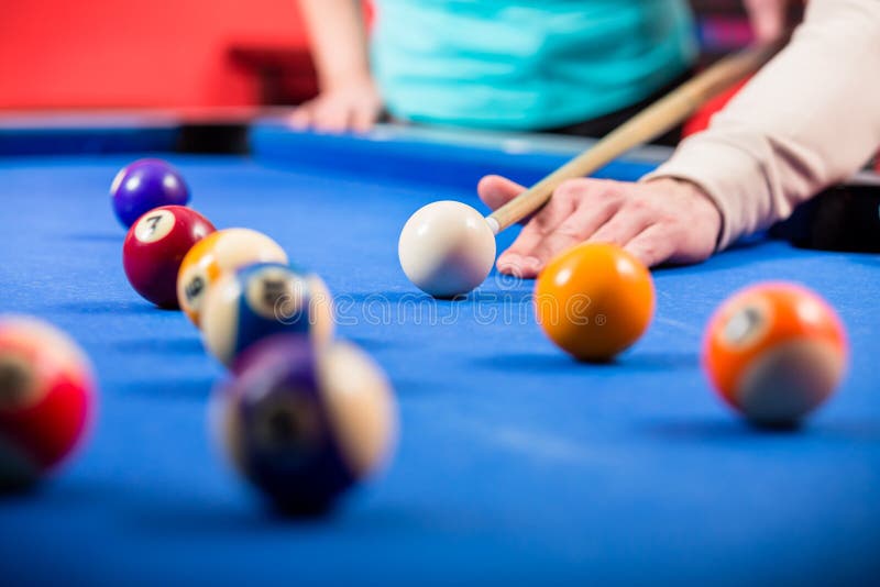 Man Playing Billiard on a Blue Pool Table Stock Photo - Image of ...