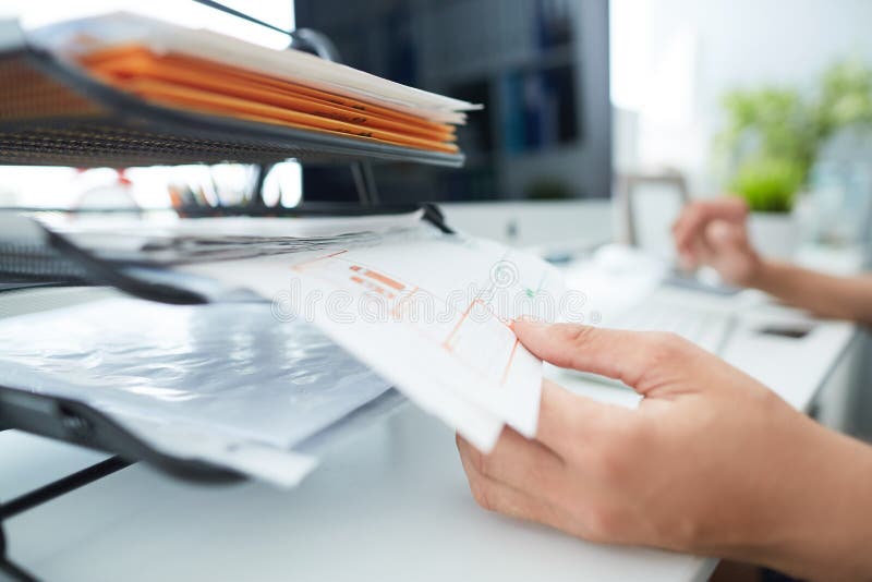 Close-up of a Man`s Hand Pulling Files from Office Shelves. Stock Image ...
