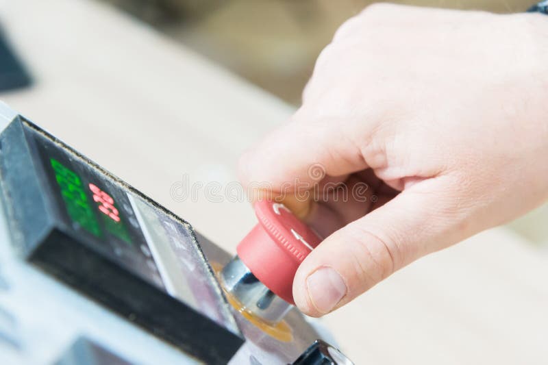 Close-up of a Man`s Hand on a Red Button on the Control Panel ...
