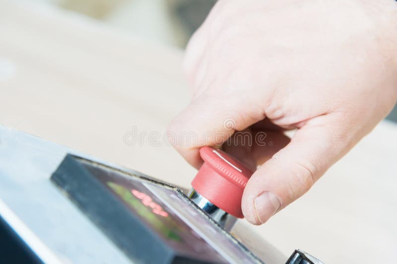 Close-up of a Man`s Hand on a Red Button on the Control Panel ...